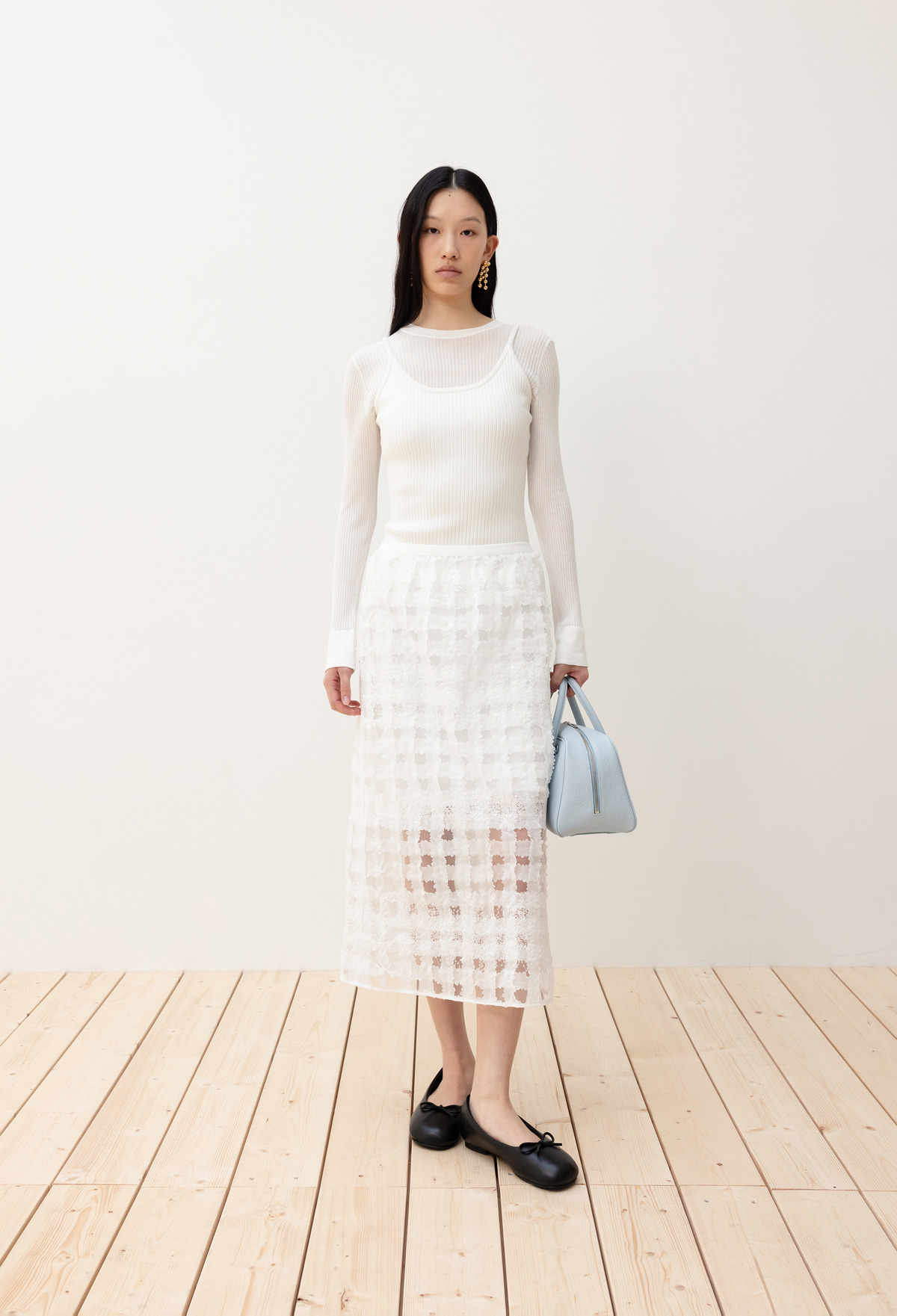 Ribbed Sleeveless Knitted Top Ivory | ファッション通販サイト NUGU